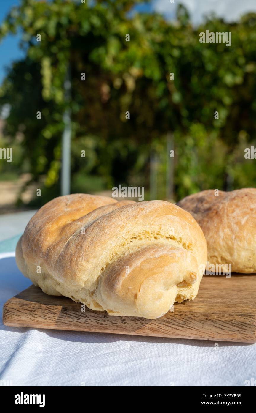 Artisan homemade wheat bread with olives baked in small mountain ...