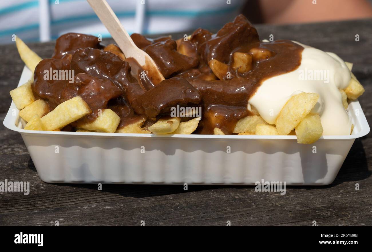 Traditional fast and street food in Belgium, French fried potatoes with ...