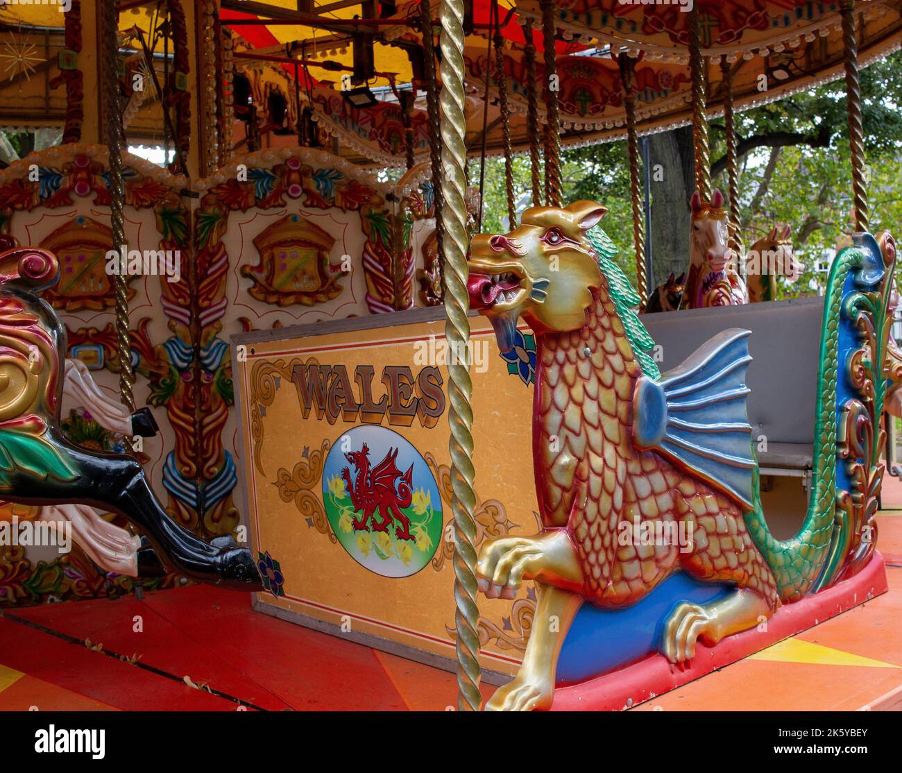 Fairground at Parsons Green, West London, UK; super-bright coloured ...