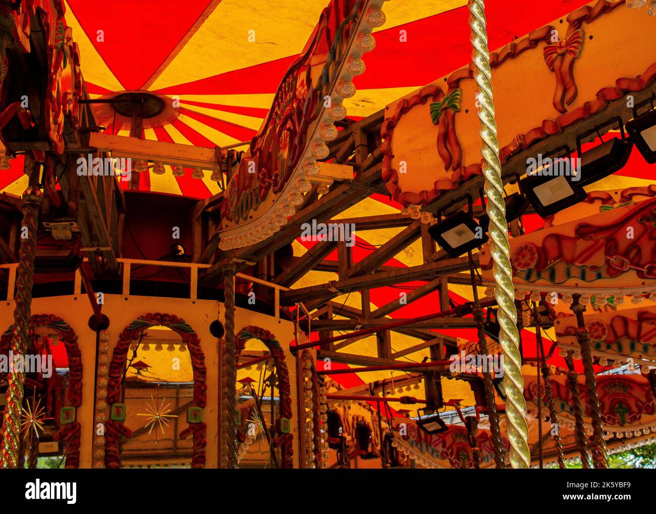 Fairground at Parsons Green, West London, UK; super-bright coloured ...