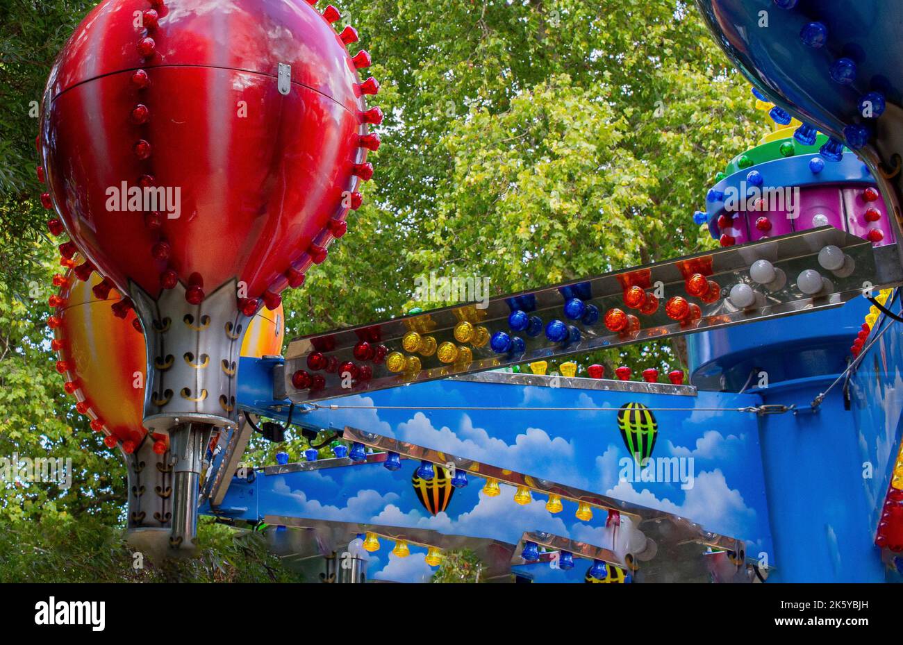 Multi-coured balloons at fairground at Parsons Green, West London, UK ...