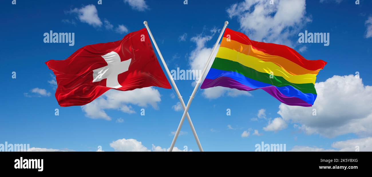 two crossed flags LGBT Pride and Switzerland waving in wind at cloudy ...