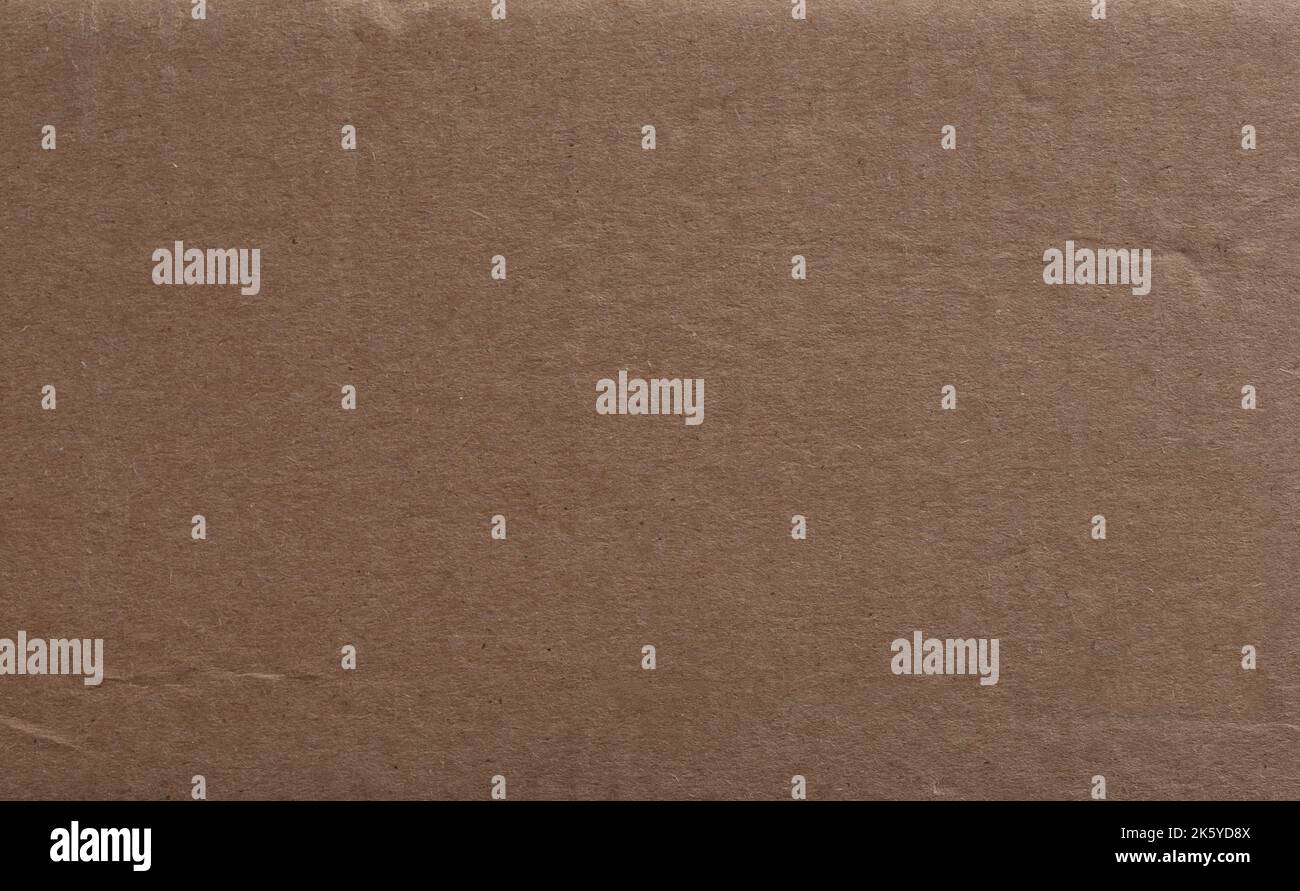 Brown clean cardboard paper texture macro close up view Stock Photo - Alamy