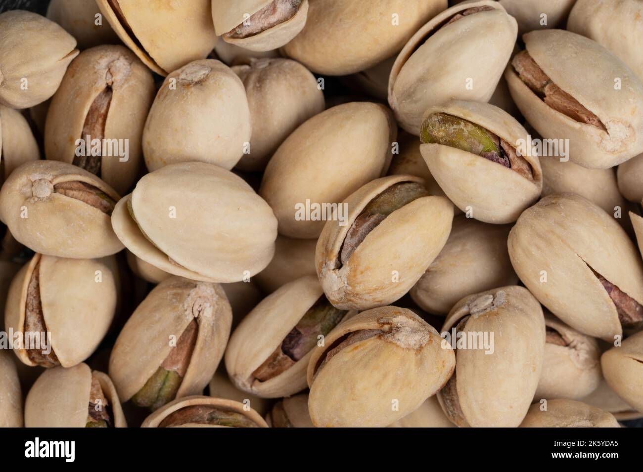 Roasted fresh open pistachios background macro close up view Stock ...