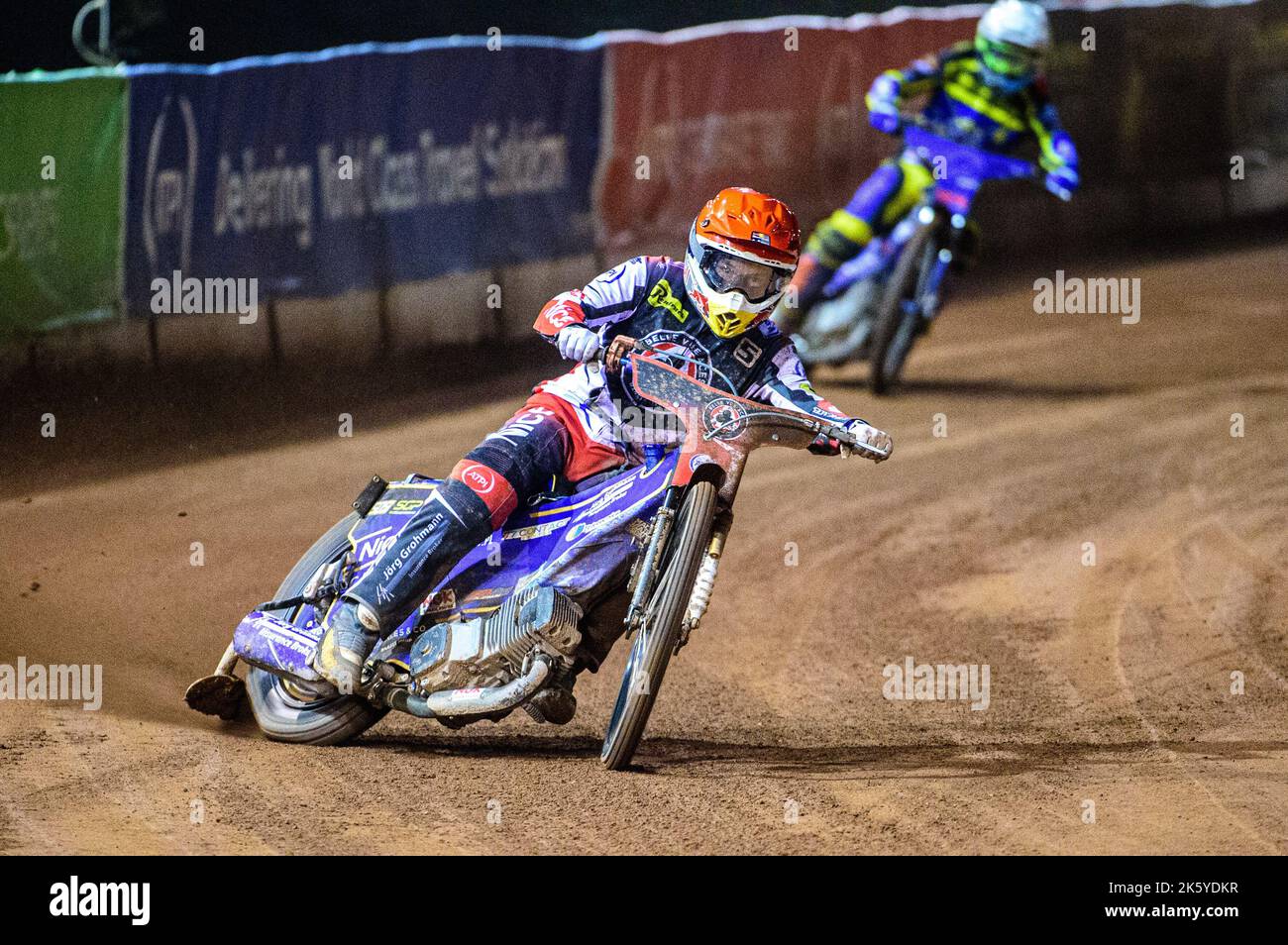 Robert Lambert (Red) leads Adam Ellis (White) during the SGB Premiership Grand Final 1st leg ...