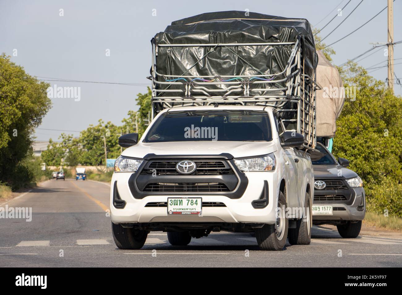 BANGKOK, THAILAND, APR 29 2022, A full loaded pick up car drives on the ...
