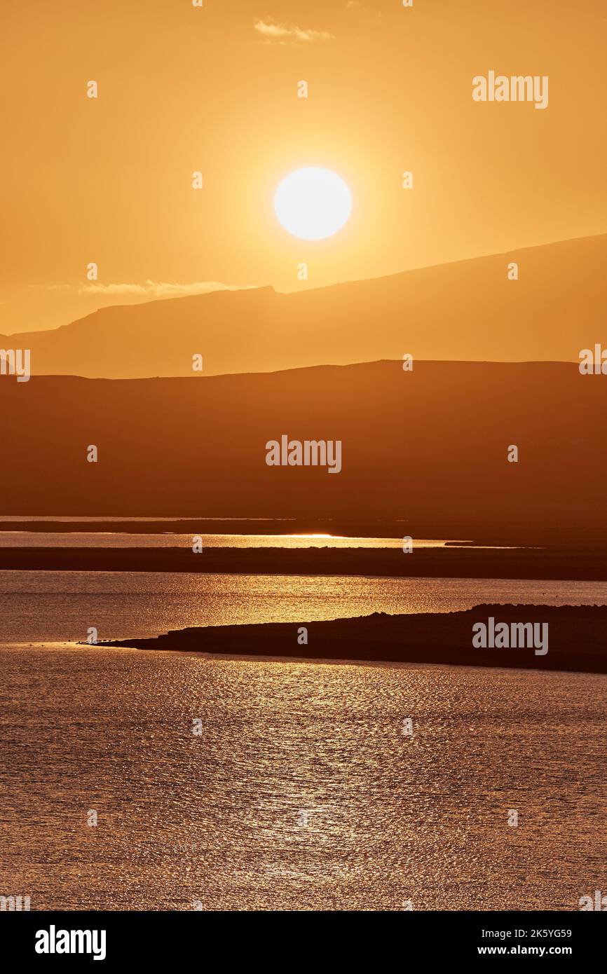 Sunset with Lake and Hilly Landscape Stock Photo - Alamy