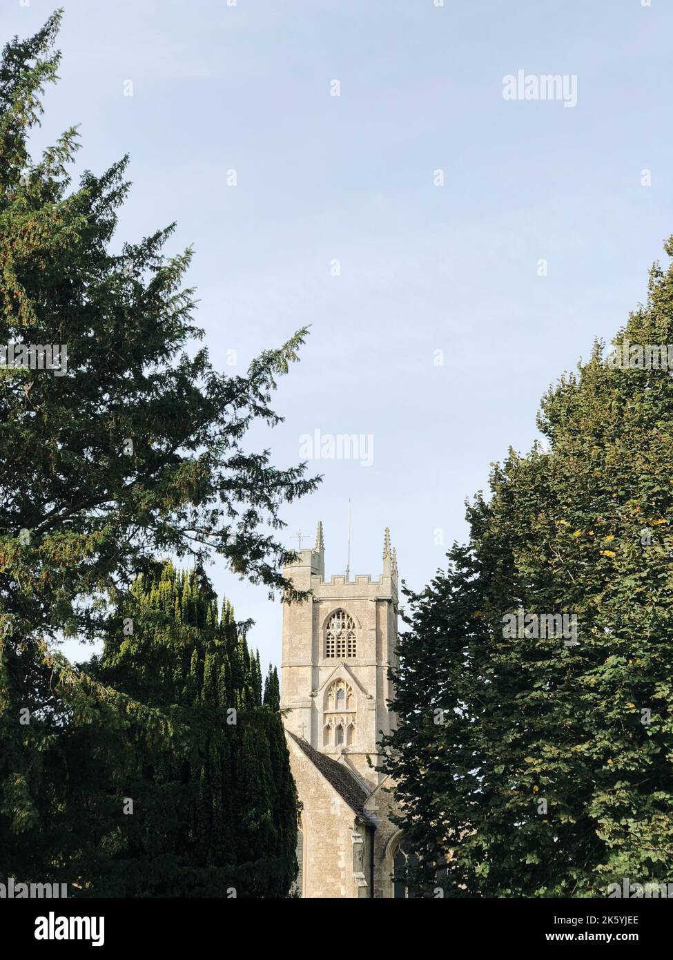 A vertical of the Church of Saint Philip and Saint James peeking ...