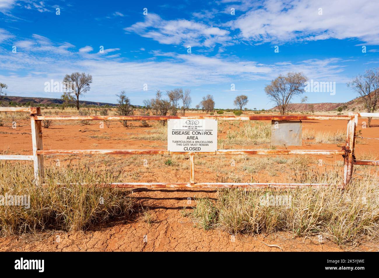Cattle disease control area sign on an old fence for tuberculosis and ...