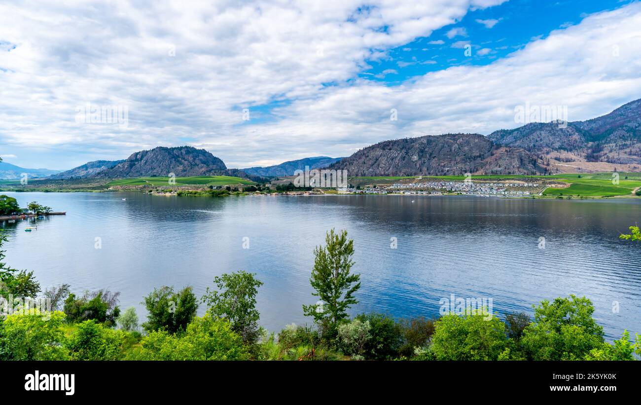 View of Osoyoos Lake with its surrounding vineyards on the mountain ...