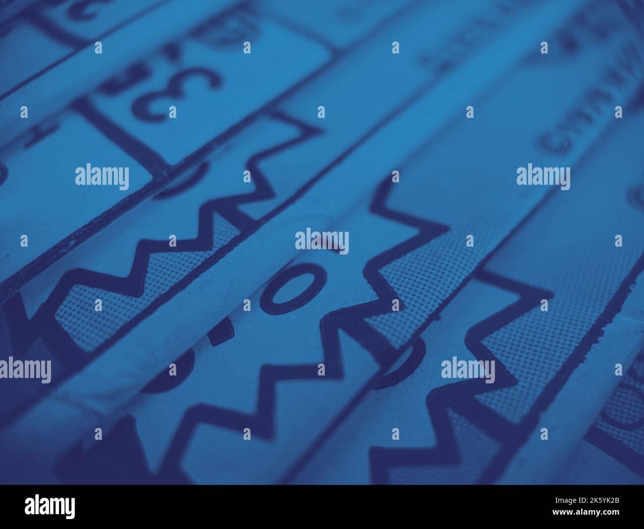 Old comic books stacked in a pile creates a colorful background with ...