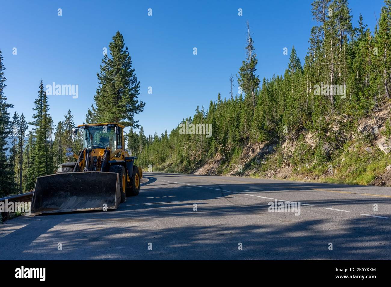Yellowstone National Park, Wyoming, USA. Snowplow sitting idle at the ...