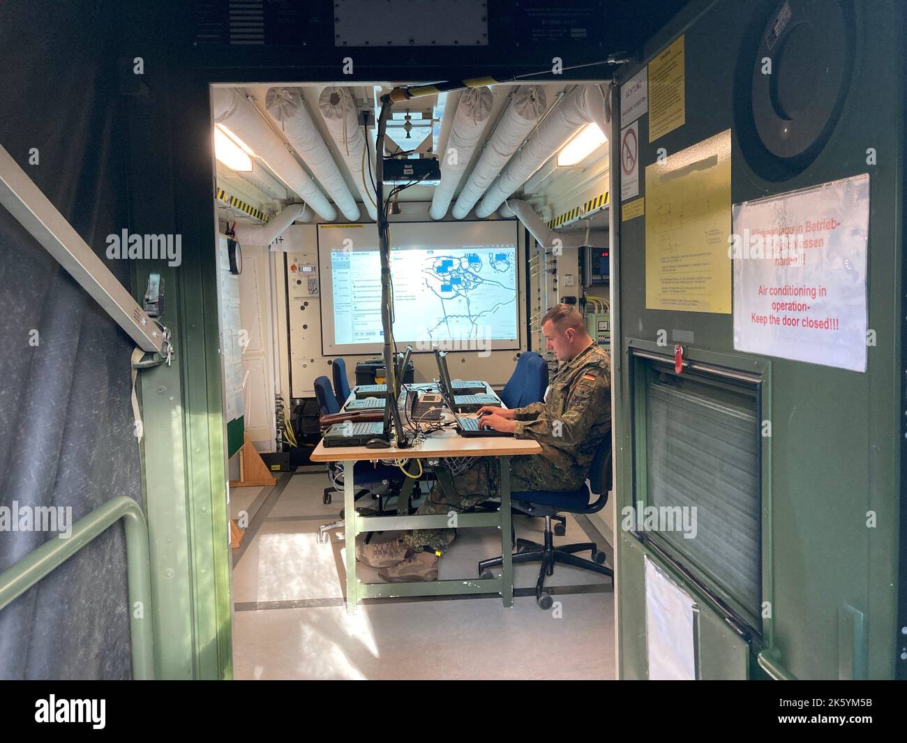 Rukla, Lithuania. 10th Oct, 2022. A Bundeswehr soldier works on a ...