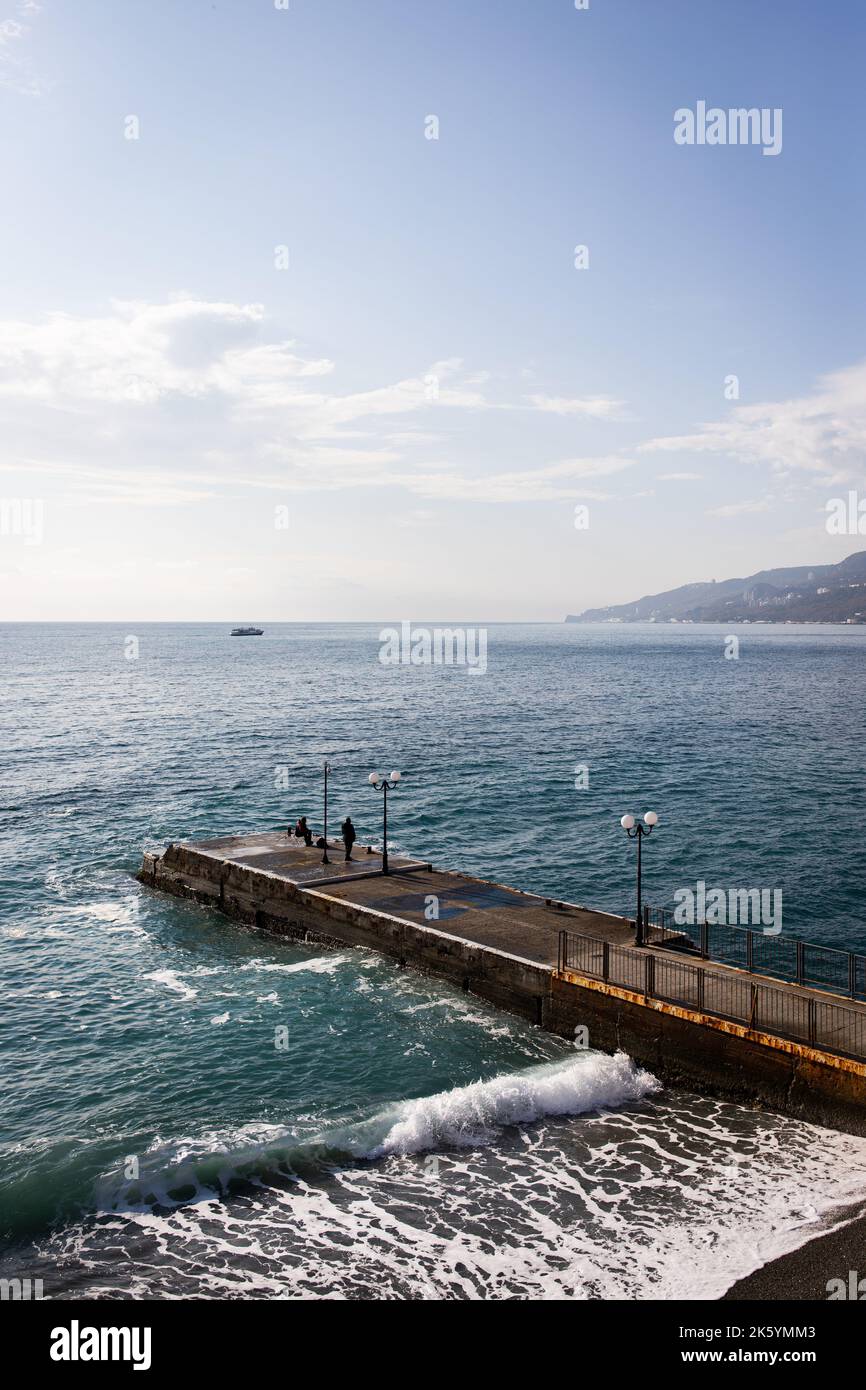 Wave crashing pier hi-res stock photography and images - Alamy