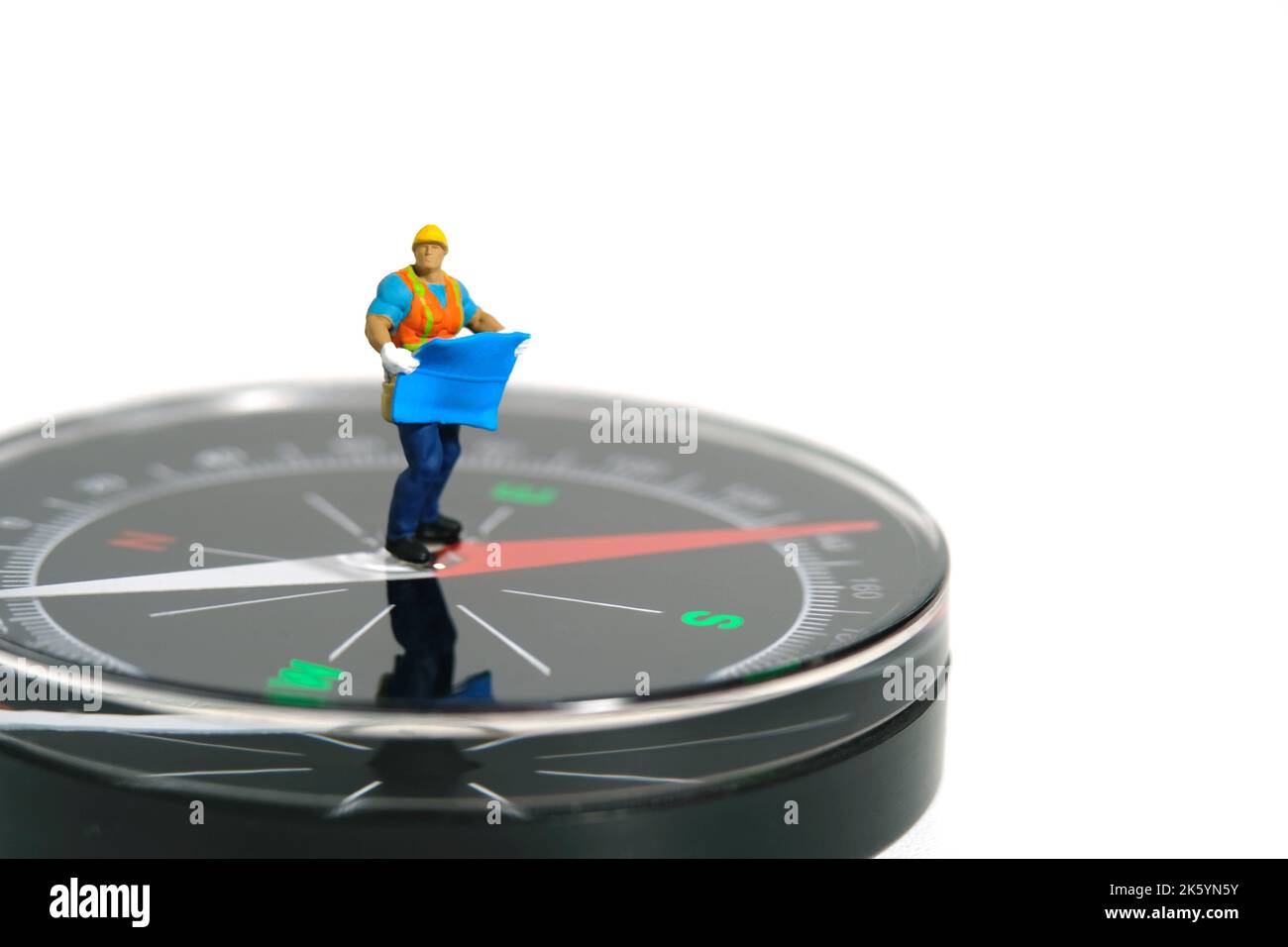 Miniature people toy figure photography. Project location concept. A ...