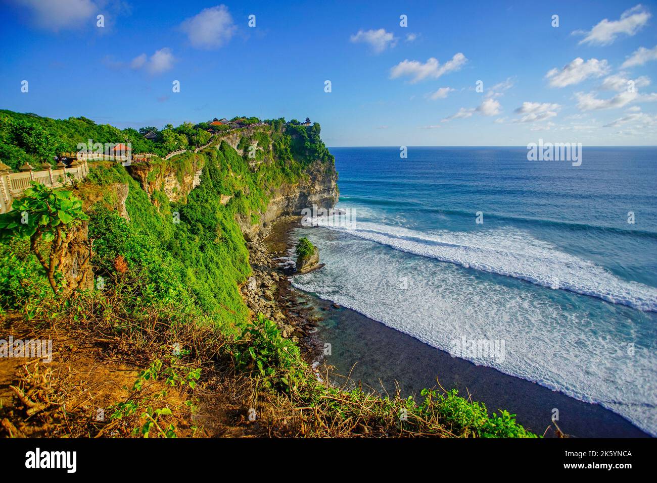 The hindu temple Pura Luhur Uluwatu situated over the cliffs of South ...