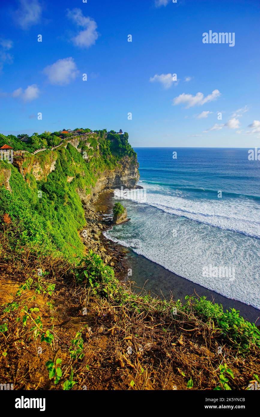 The hindu temple Pura Luhur Uluwatu situated over the cliffs of South ...