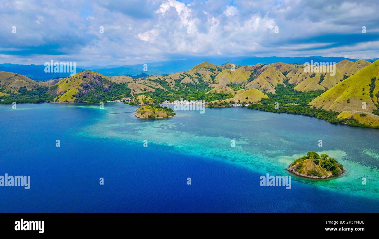 Aerial shot of beautiful blue lagoon at hot summer day with sailing ...