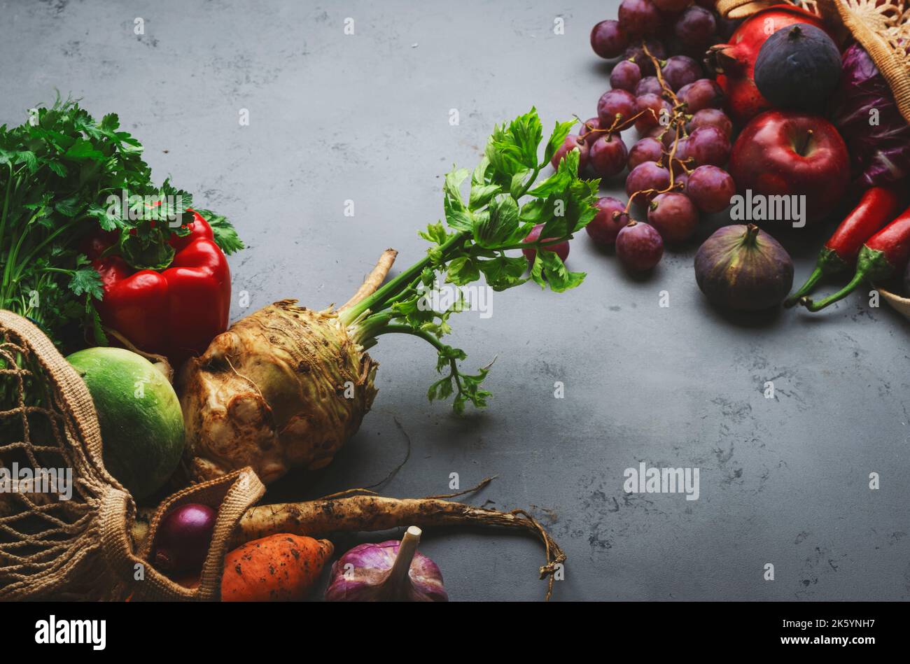 Autumn food background with vegetables, root crops and red fruits in ...