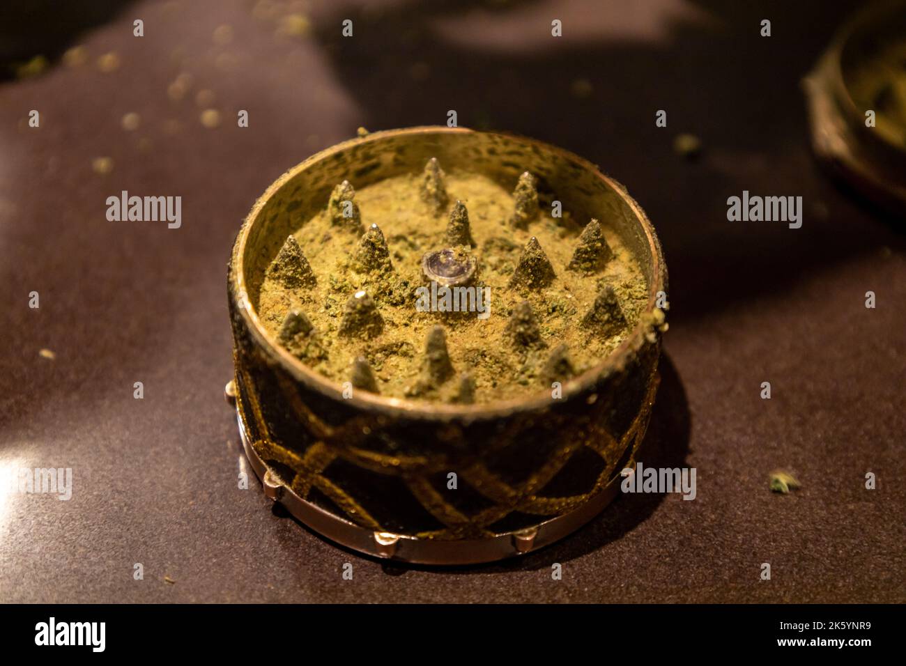 Tool used to chop the marijuana flower to roll cigarettes Stock Photo ...