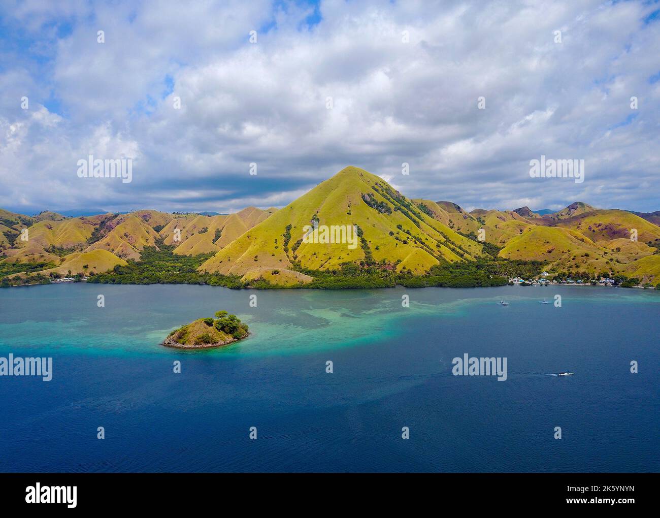 Beautiful aerial view of beaches and tourist boat sailing in Flores ...