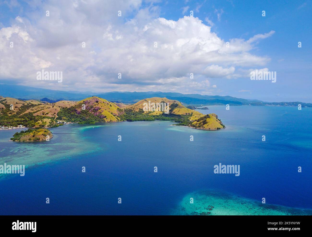 Beautiful aerial view of beaches and tourist boat sailing in Flores ...