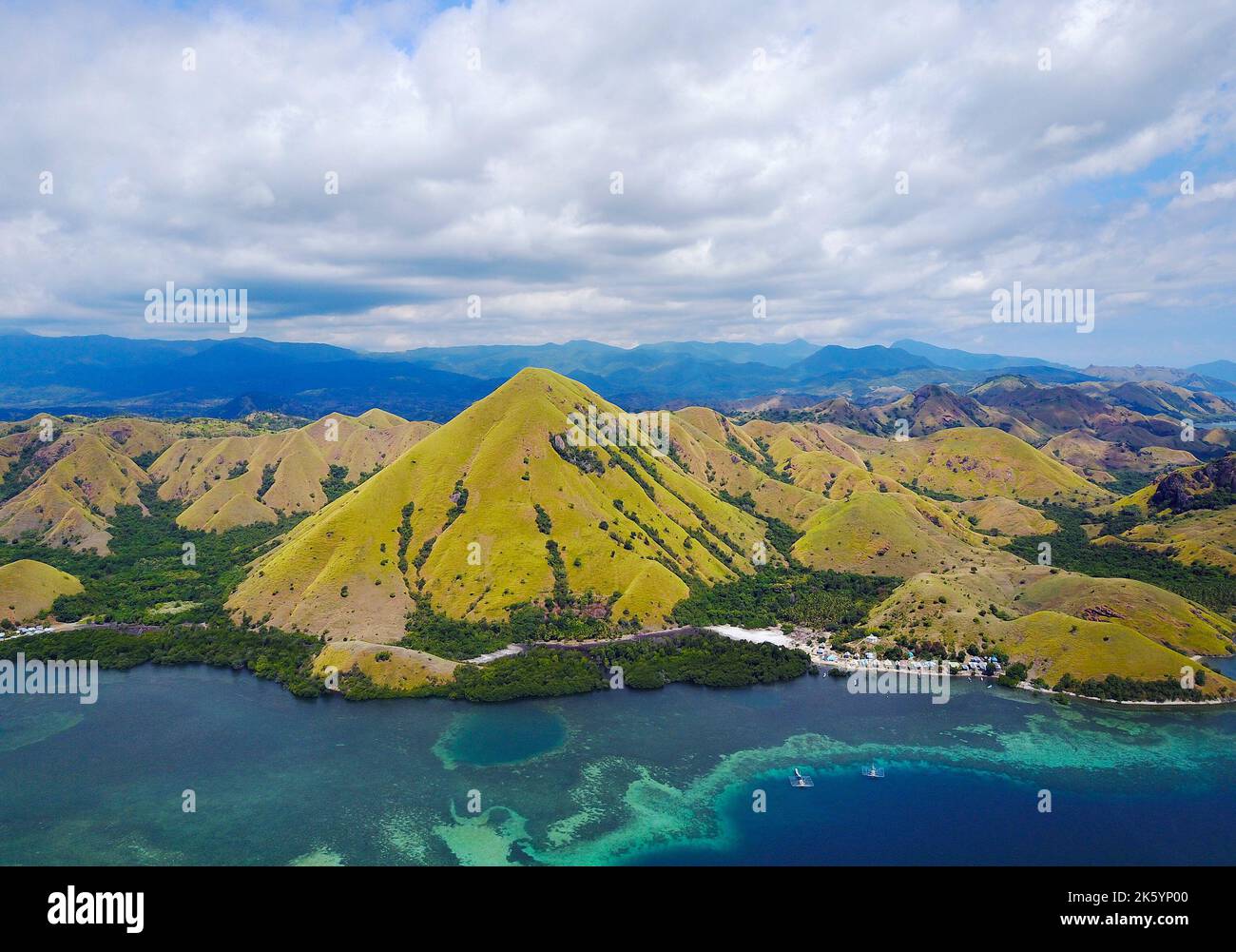 Beautiful aerial view of beaches and tourist boat sailing in Flores ...