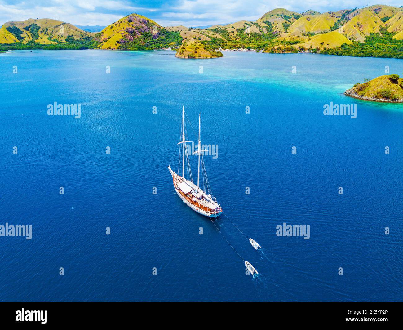 Arial view of beautiful scenery at Flores island with tourist yatch ...