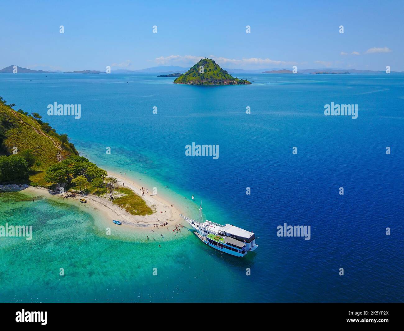 Aerial view of beautiful scenery at Flores island with tourist yatch ...