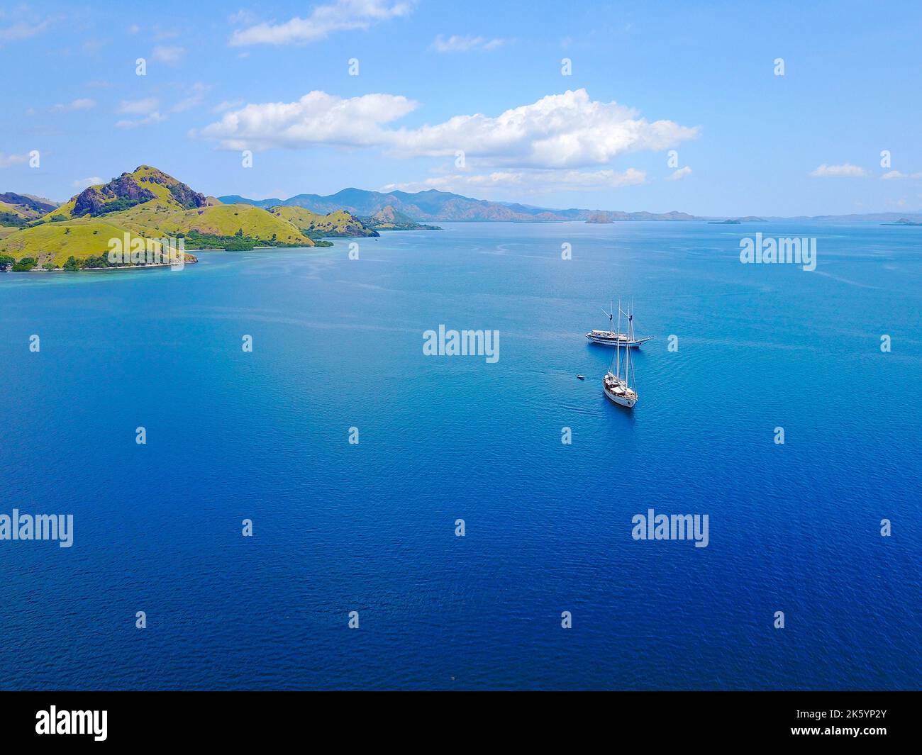 Aerial view of beautiful scenery at Flores island with tourist yatch ...