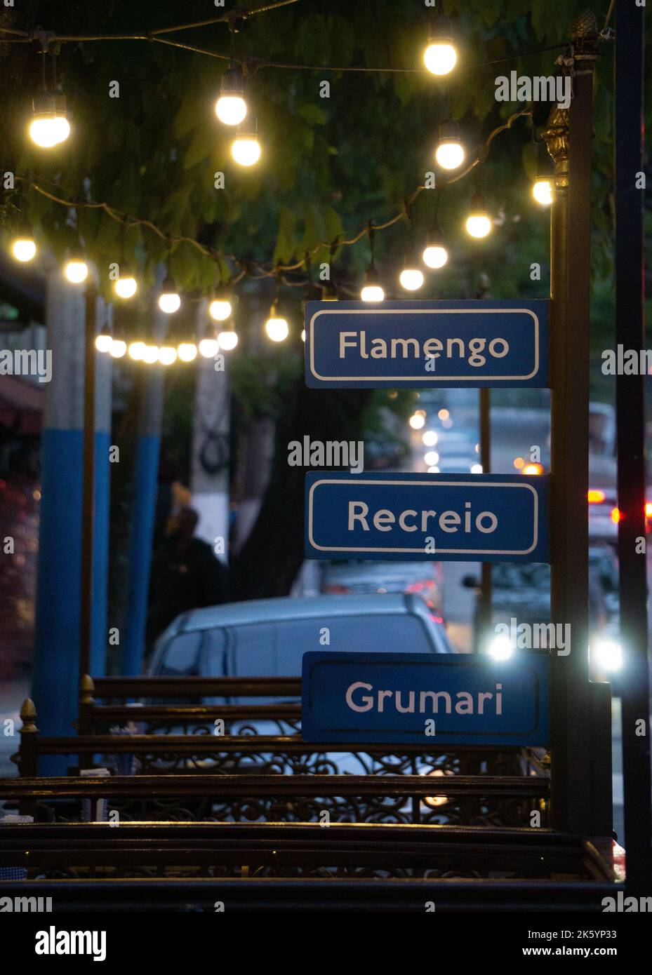 The Brazilian street pole signs with location names with lights in the ...