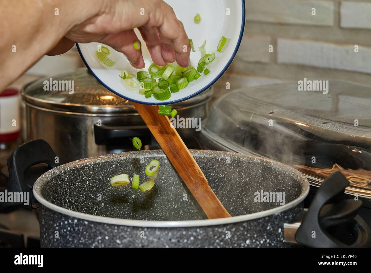 Chef throws hi-res stock photography and images - Alamy