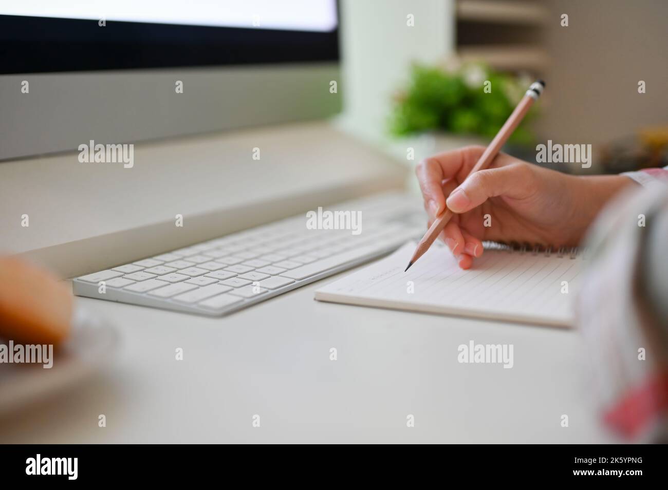 Student hand writing a report hi-res stock photography and images - Alamy