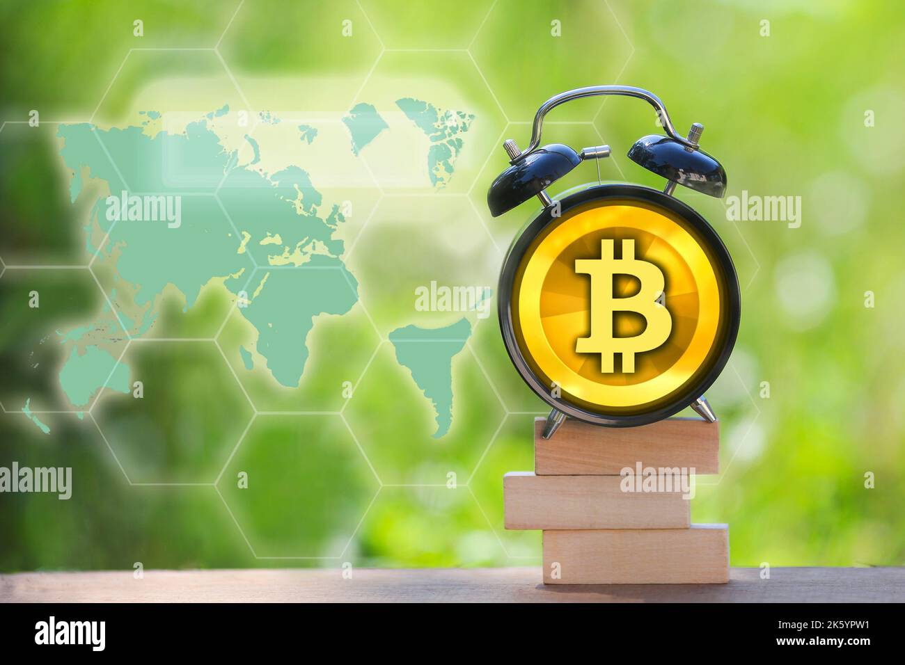 Bitcoin on black alarm clock with world map on background Stock Photo ...