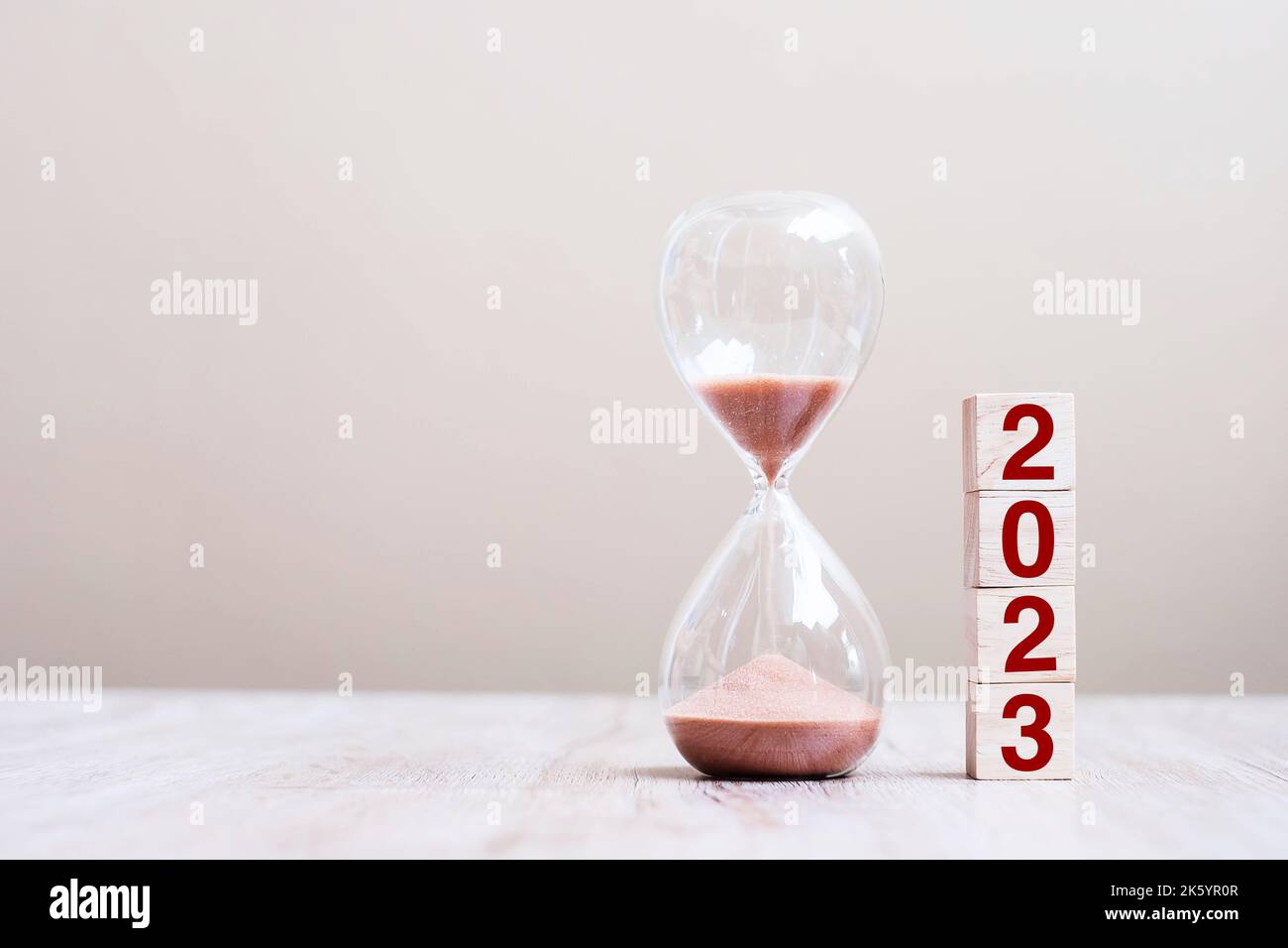 2023 text with hourglass on table. Resolution, time, plan, goal ...