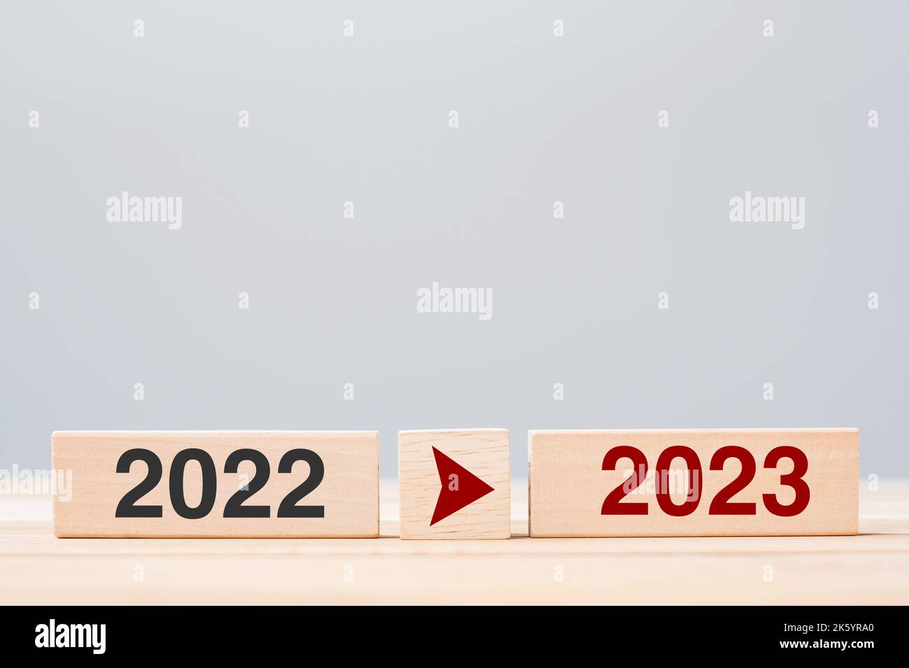 2023 and 2022 wooden block on table background. Resolution, strategy ...