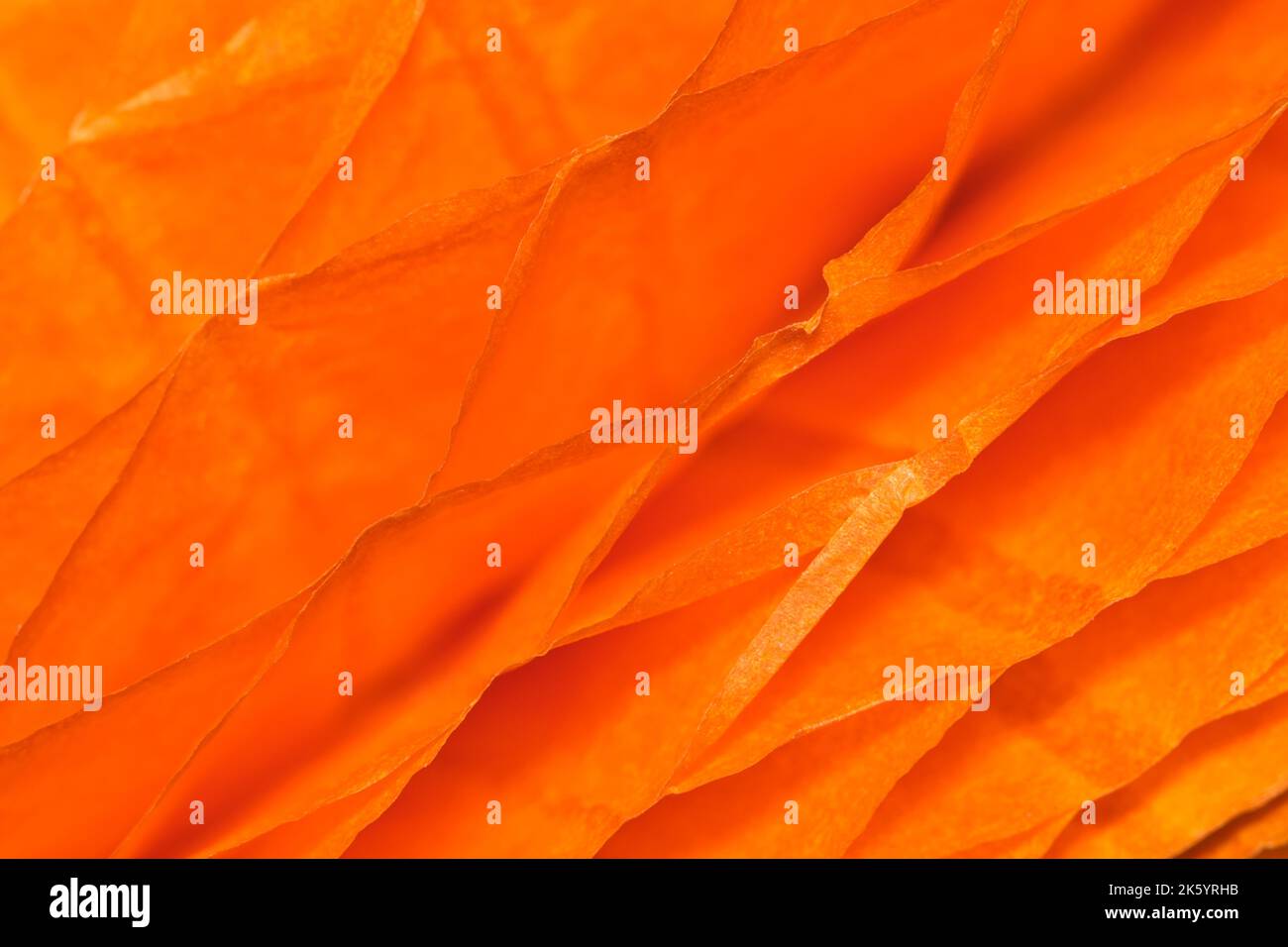Orange colored ruffled paper cells abstract patterns and textures ...