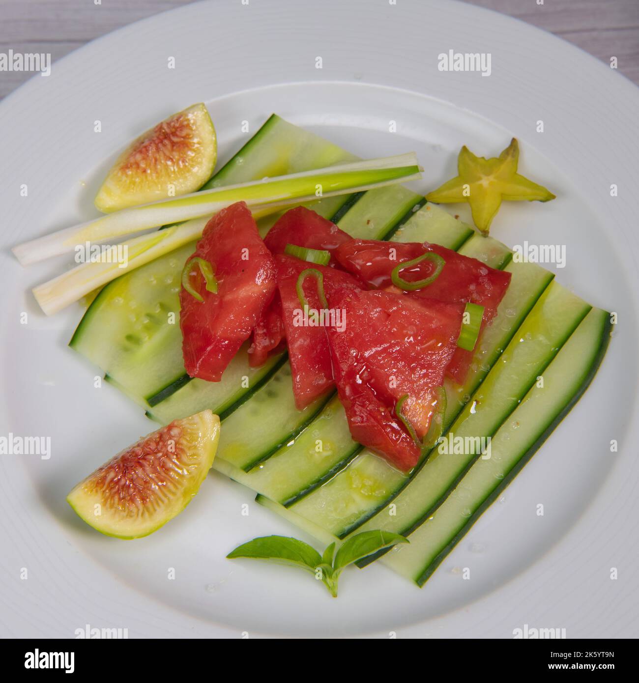 Recipe for cucumber, tomato, cebette, fig and carambola salad Stock ...