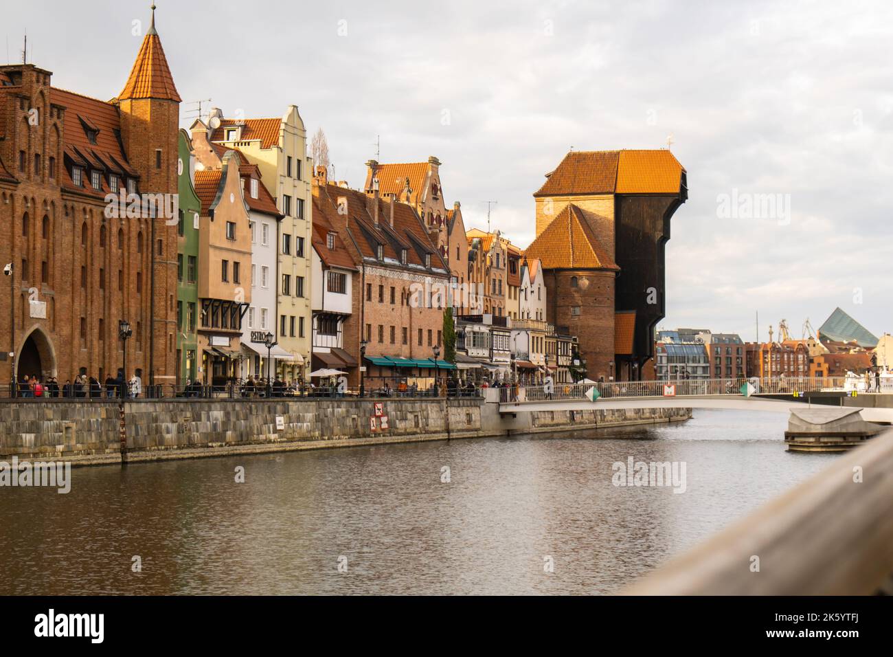 Ancient crane - zuraw Old town in Gdansk. The riverside on Granary ...