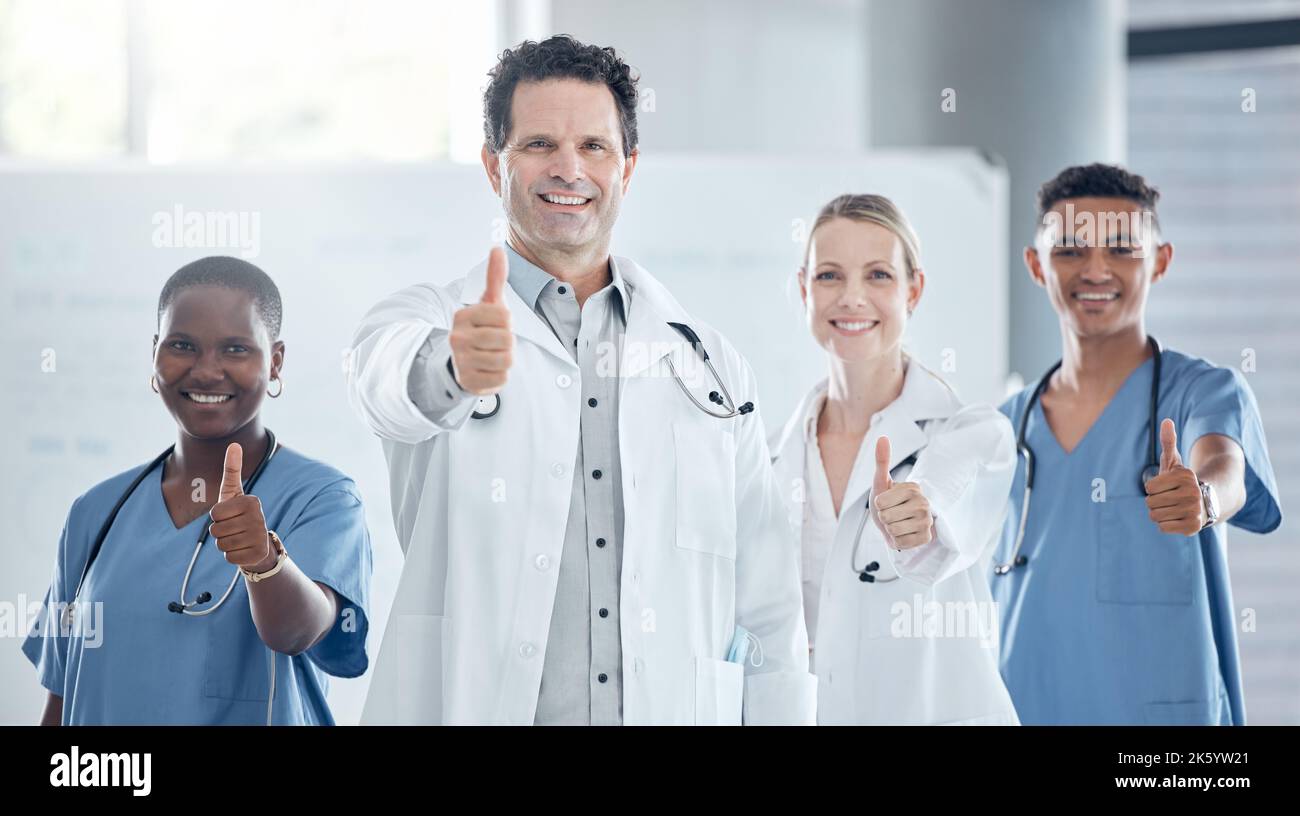 Thumbs up, doctor and happy nurse staff together with success, thank ...
