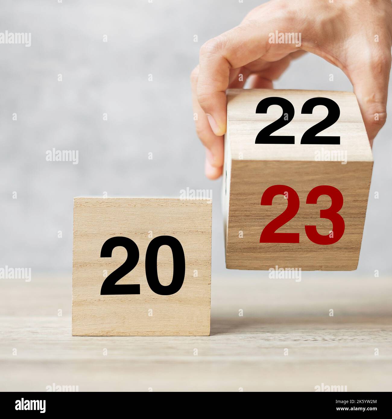 hand flipping block 2022 to 2023 text on table. Resolution, strategy ...