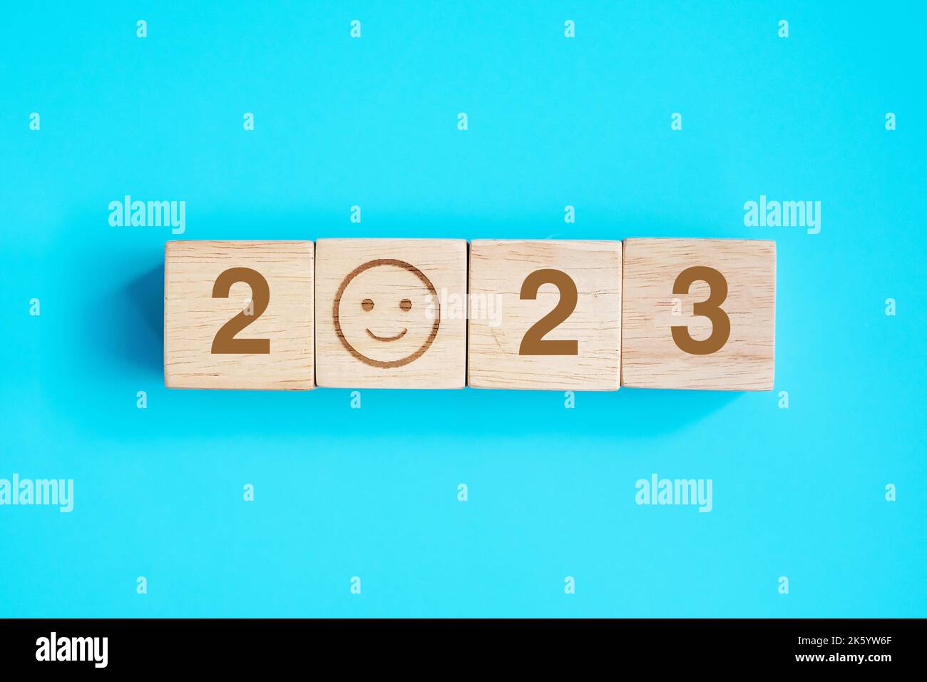 Smile face block with 2023 text on blue background. Satisfaction ...