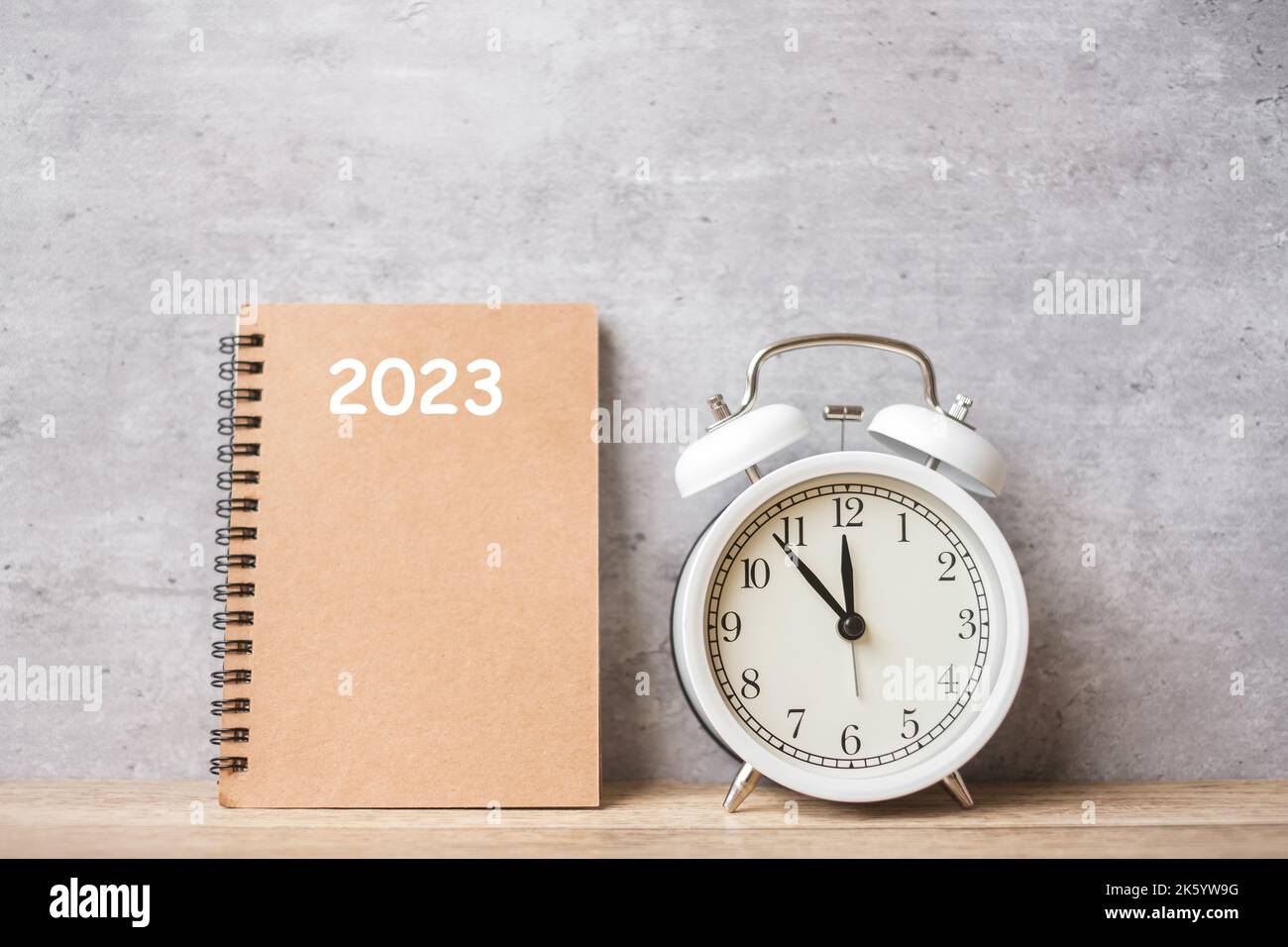 Happy New Year with vintage alarm clock and 2023 calendar. Christmas ...