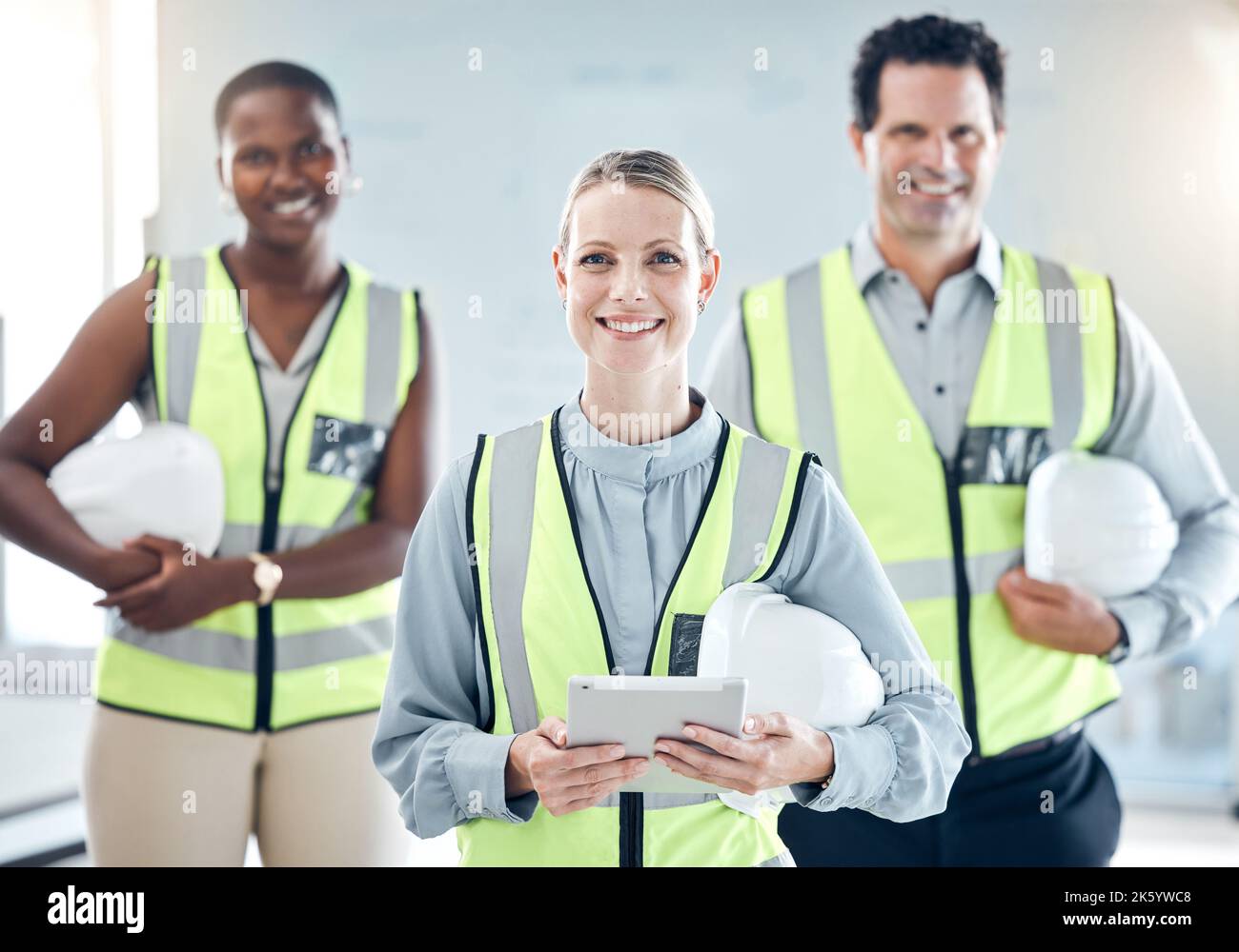 Teamwork, tablet and engineer people or construction worker group ...