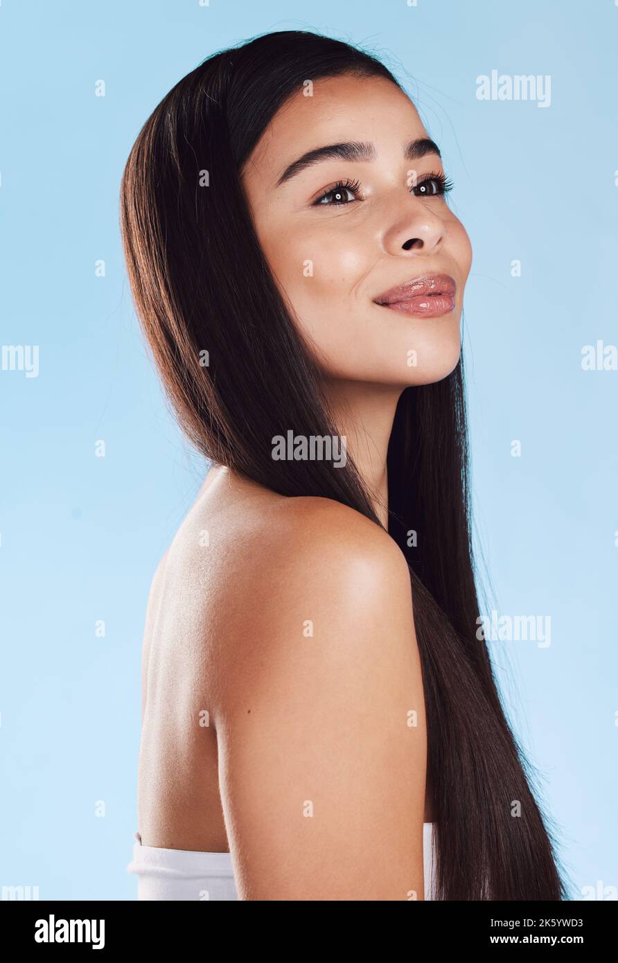 One beautiful young hispanic woman with healthy skin and sleek long ...