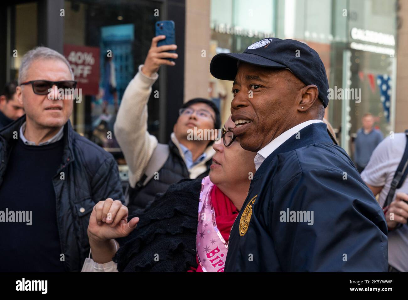 Mayor Eric Adams greets spectators while marches at annual Columbus Day ...