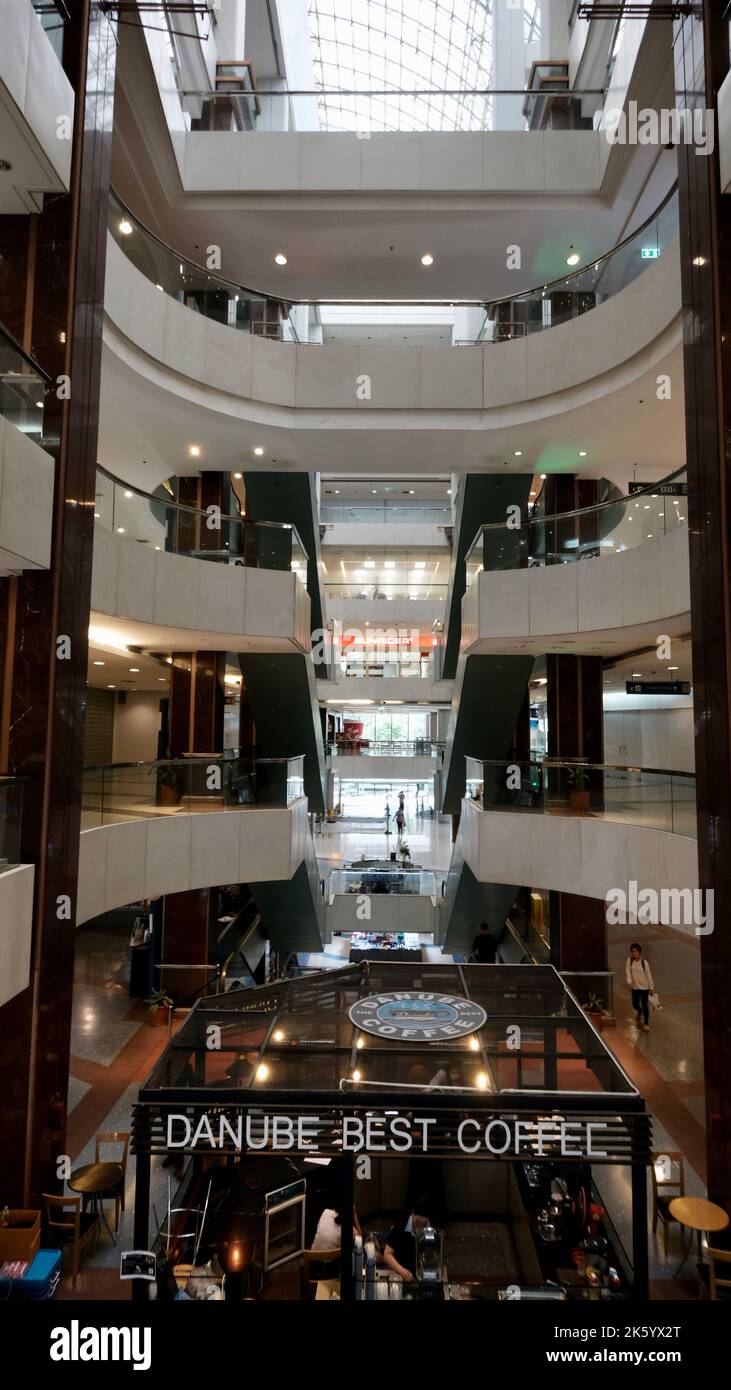 Inside view of luxury shopping mall skylight high endbalconies in ...