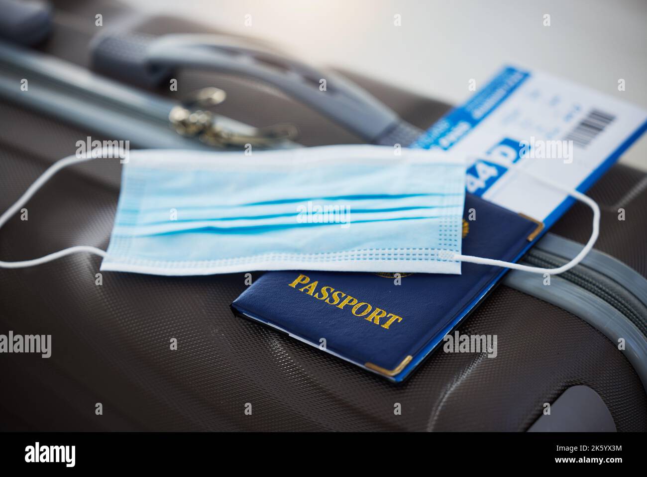 Covid mask, travel safety and airport documents for immigration, plane ...