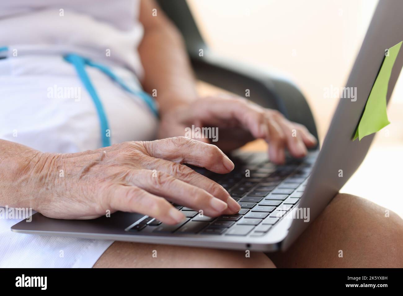 Hands on elderly woman typing hi-res stock photography and images - Alamy