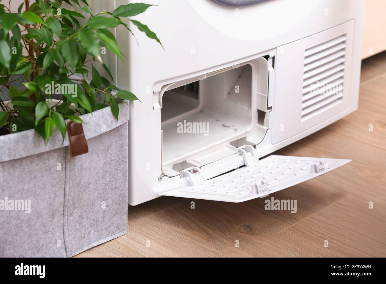 Drying machine with a full filter of lint, hair, dust, wool after the ...